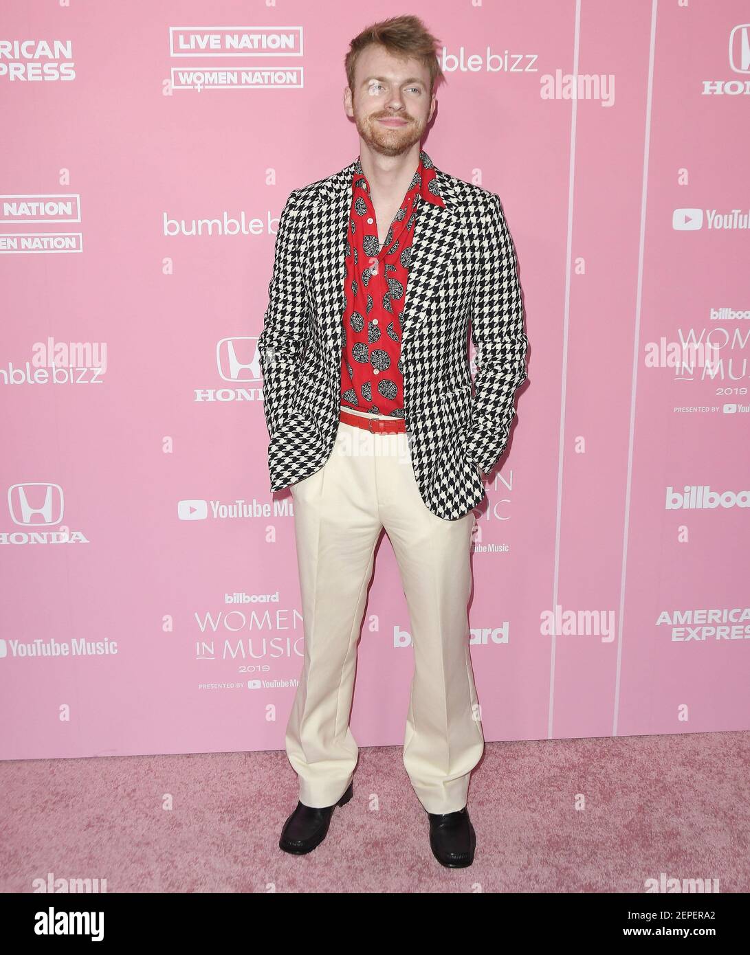 Finneas O'Connell arrives at the 2019 Billboard Women in Music held at ...