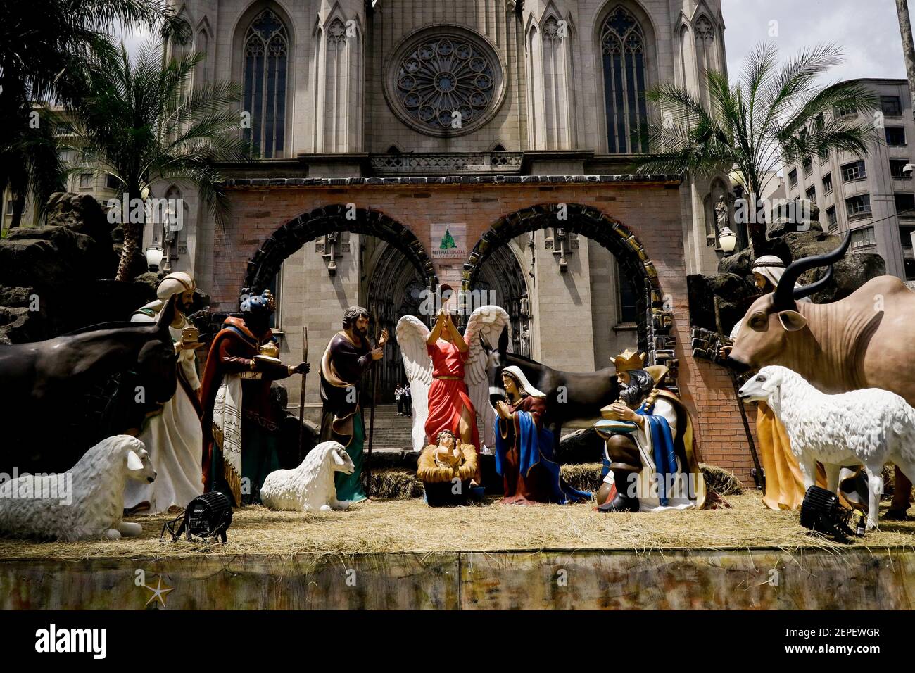 People enjoy a giant nativity scene was set up in front of the Catedral ...