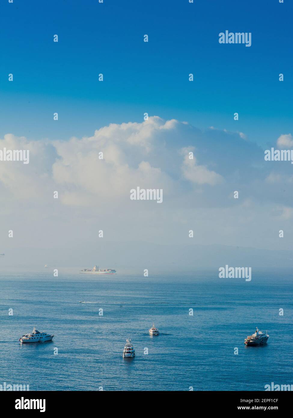 Boats the background of the sea and blue sky with beautiful clouds ...