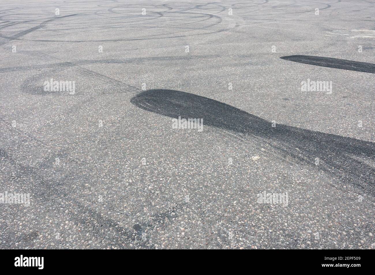 Car track with rubber drift traces. asphalt pavement background texture ...