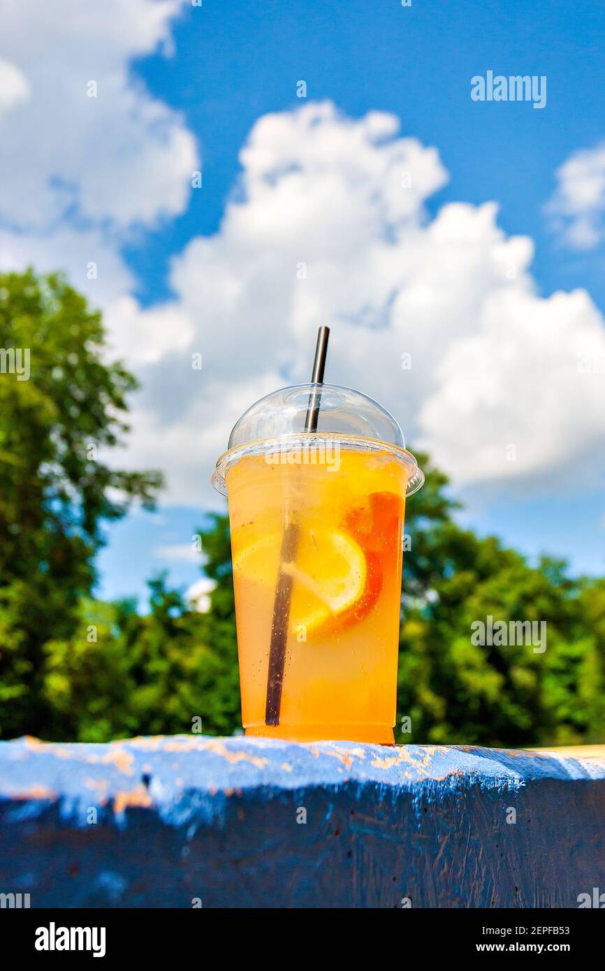 fresh icy fruit juice cocktail at urban background. healthy lifestyle ...