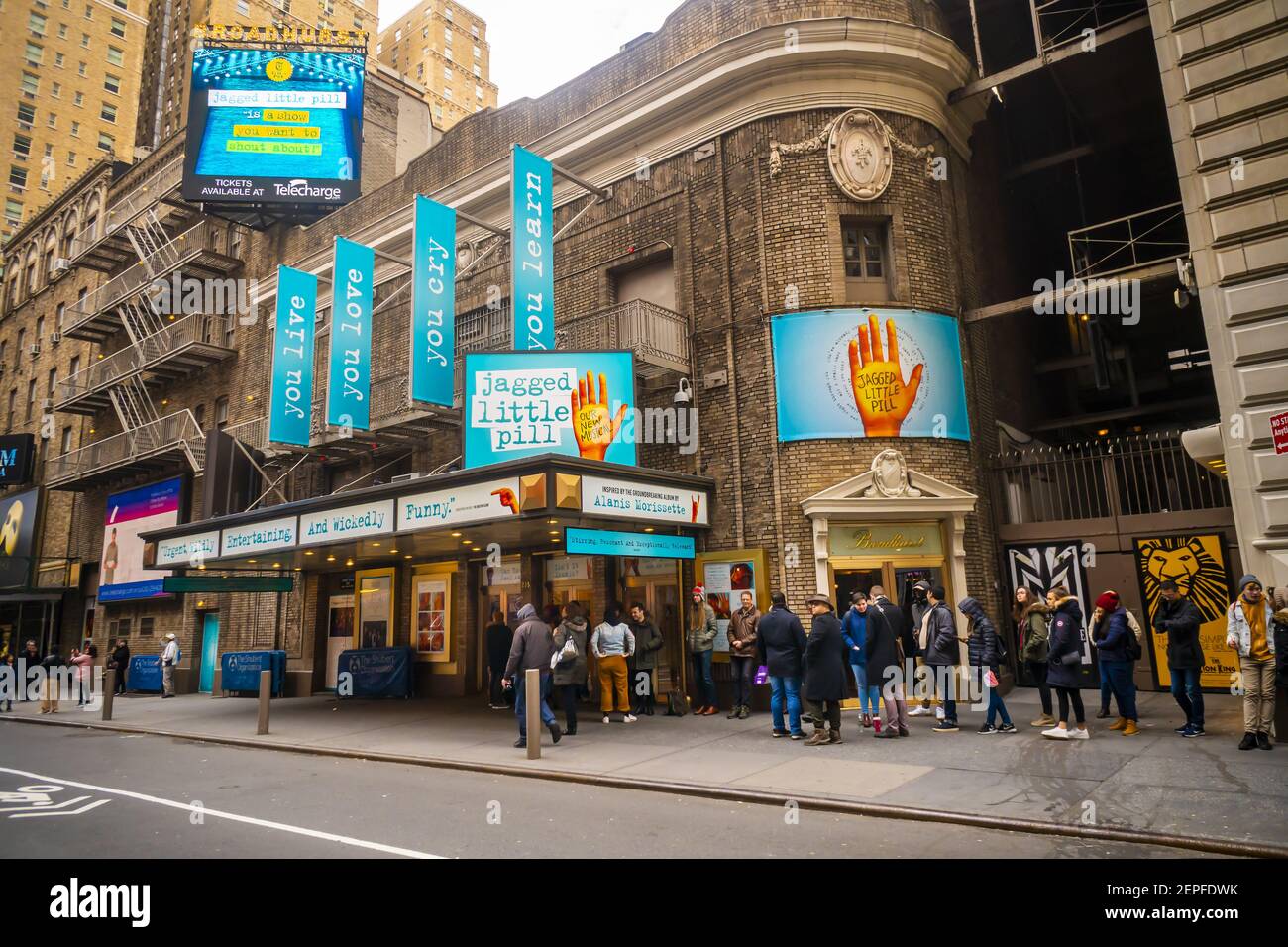 Theatergoers descend on the Broadhurst Theatre in New York to buy ...