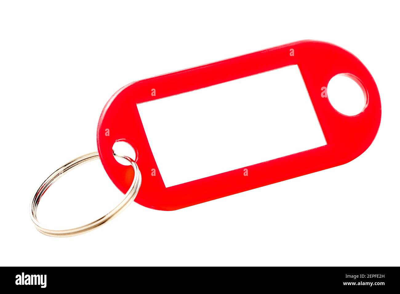 red key color trinket with white paper label. isolated Stock Photo - Alamy