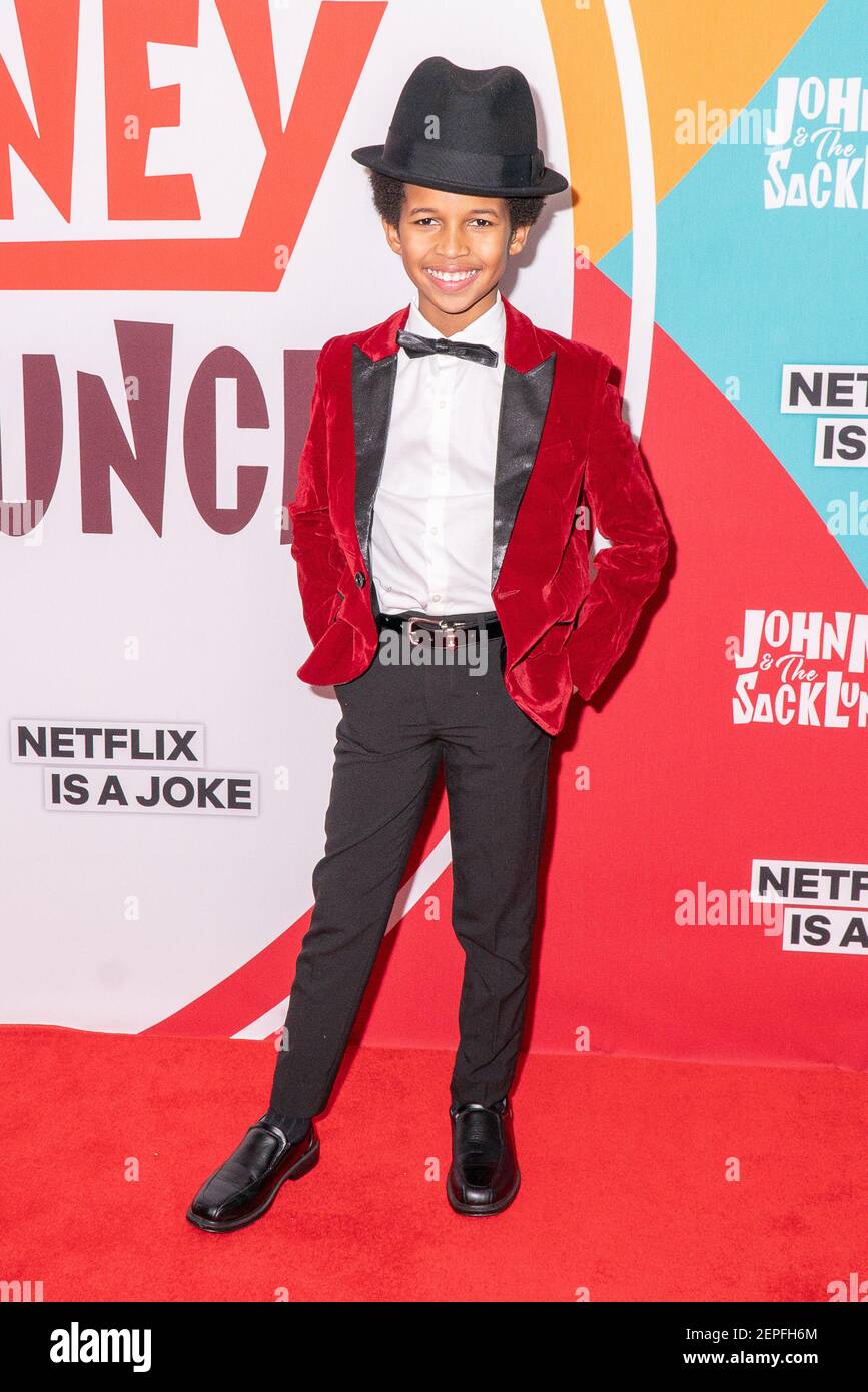 Alexander Bello attends the red carpet at the Netflix premiere of John ...