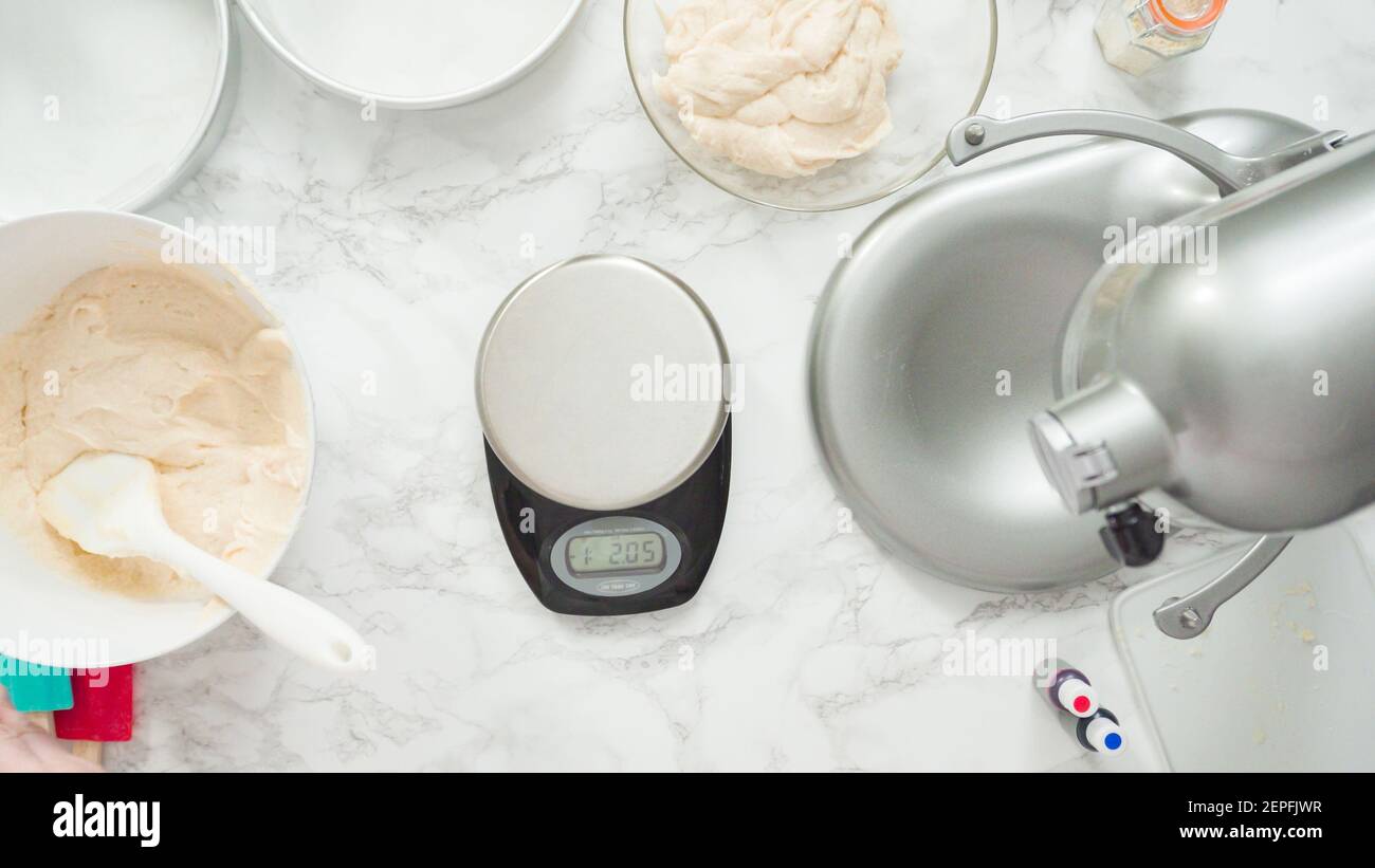 Step by step. Flat lay. Measuring cake batter with a digital kitchen ...