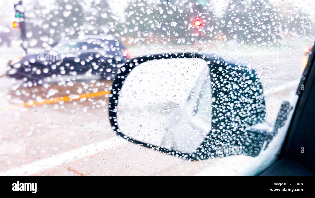 Driving in typical North American suburbs during the first snowstorm of ...