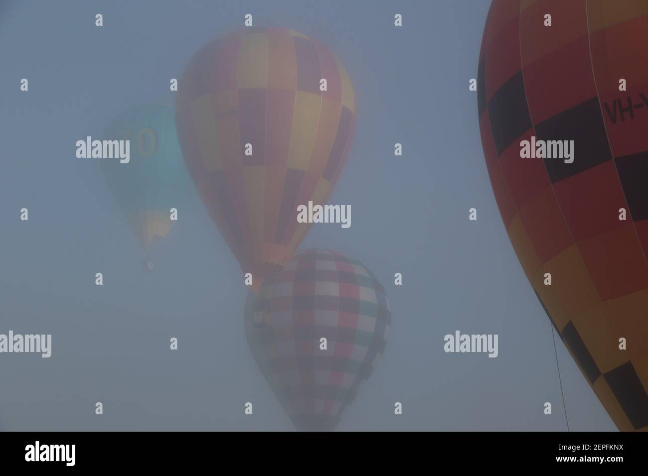 Hot Air Balloons in Mist Stock Photo - Alamy