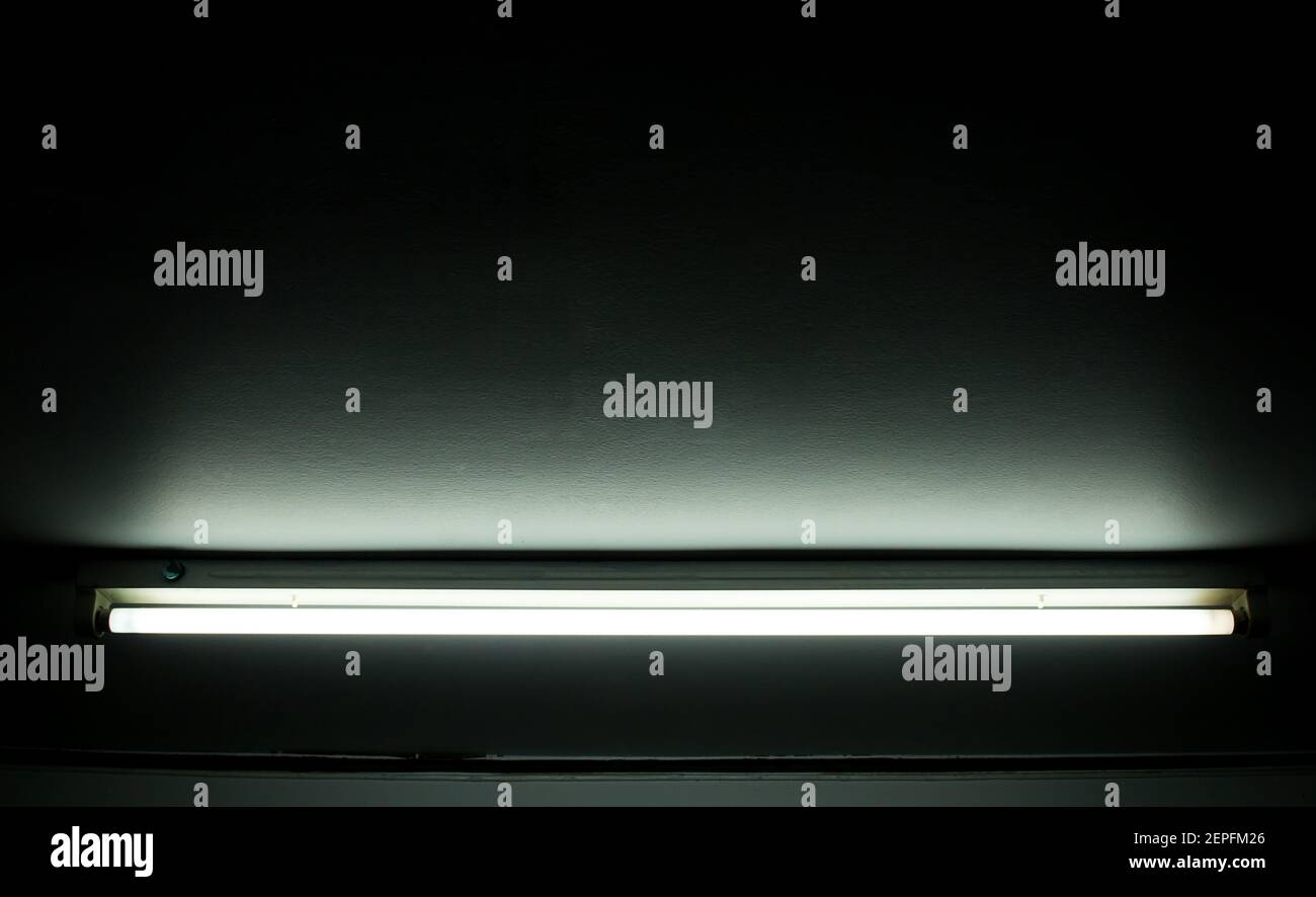 Detail of a fluorescent light tube on a wall. fluorescent light tube ...