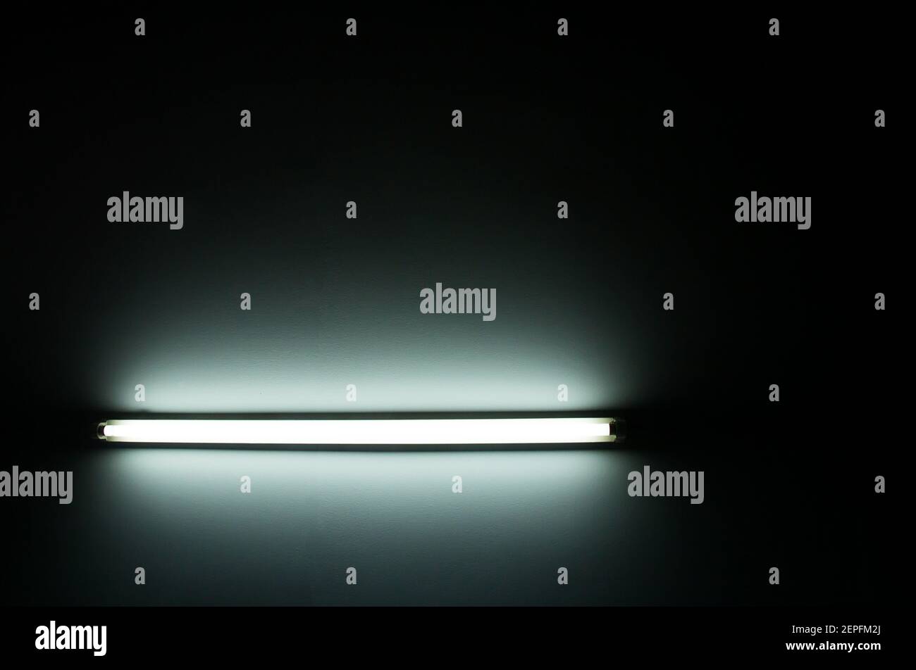 Detail of a fluorescent light tube on a wall. fluorescent light tube ...