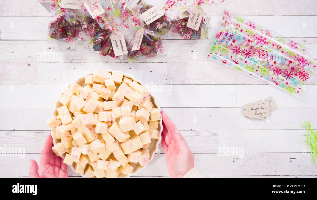 Flat lay. Step by step. Packaging homemade candy cane fudge into small ...