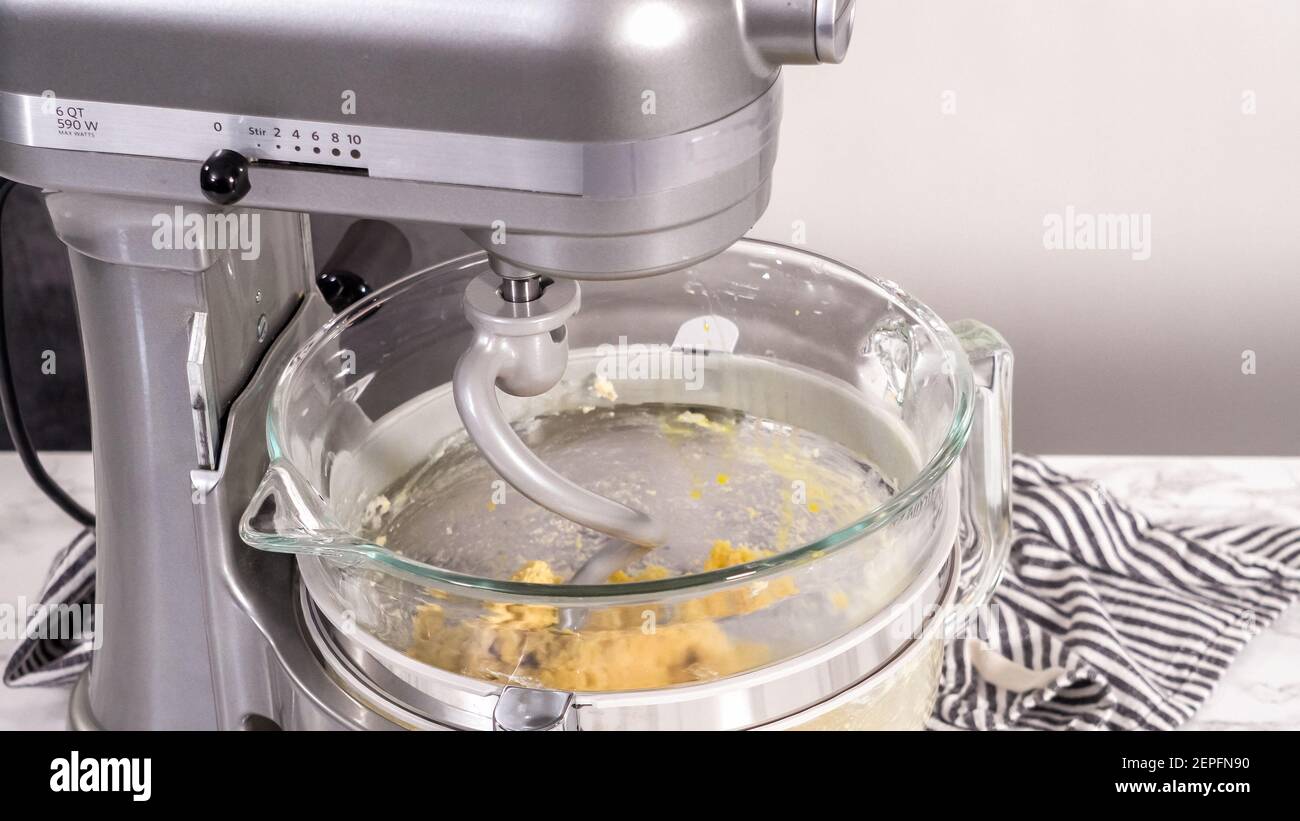 Step by step. Mixing ingredients in kitchen mixer to bake homemade ...