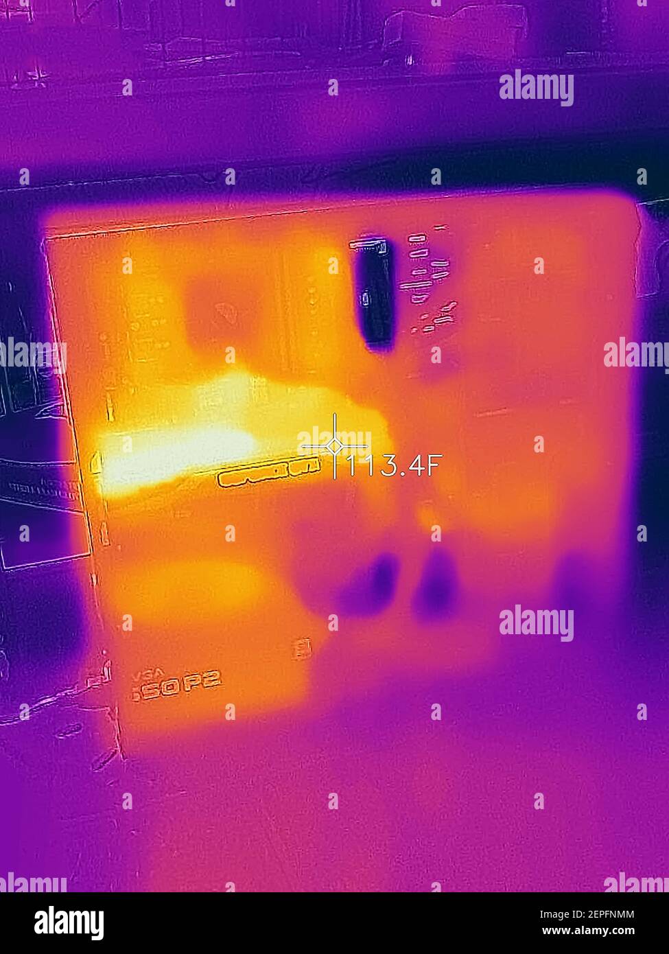 Thermal camera image showing the heat generated by a computer with an ...