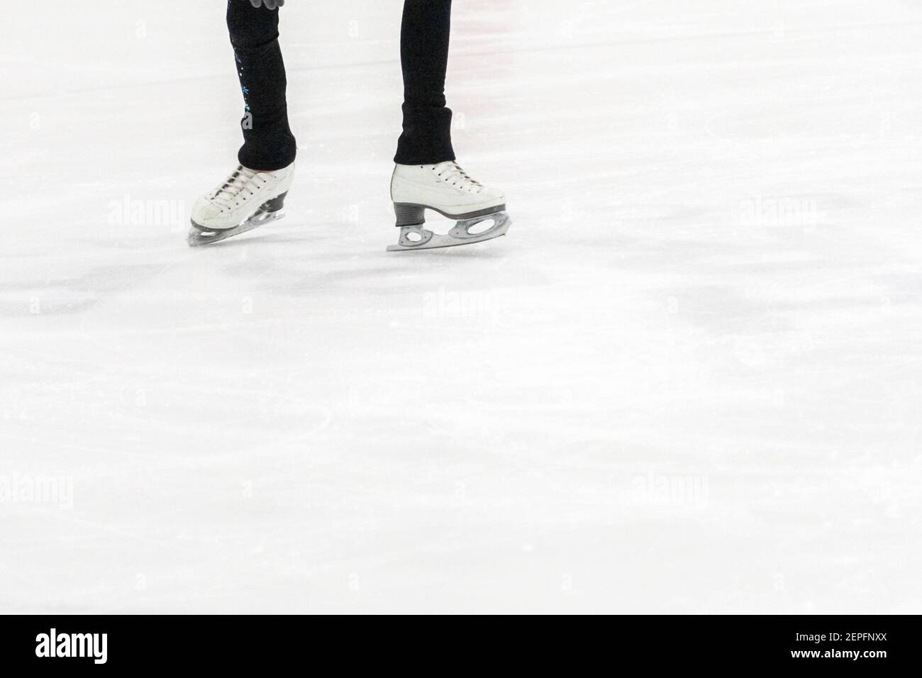 View of figure skater feet at the figure skating practice Stock Photo ...