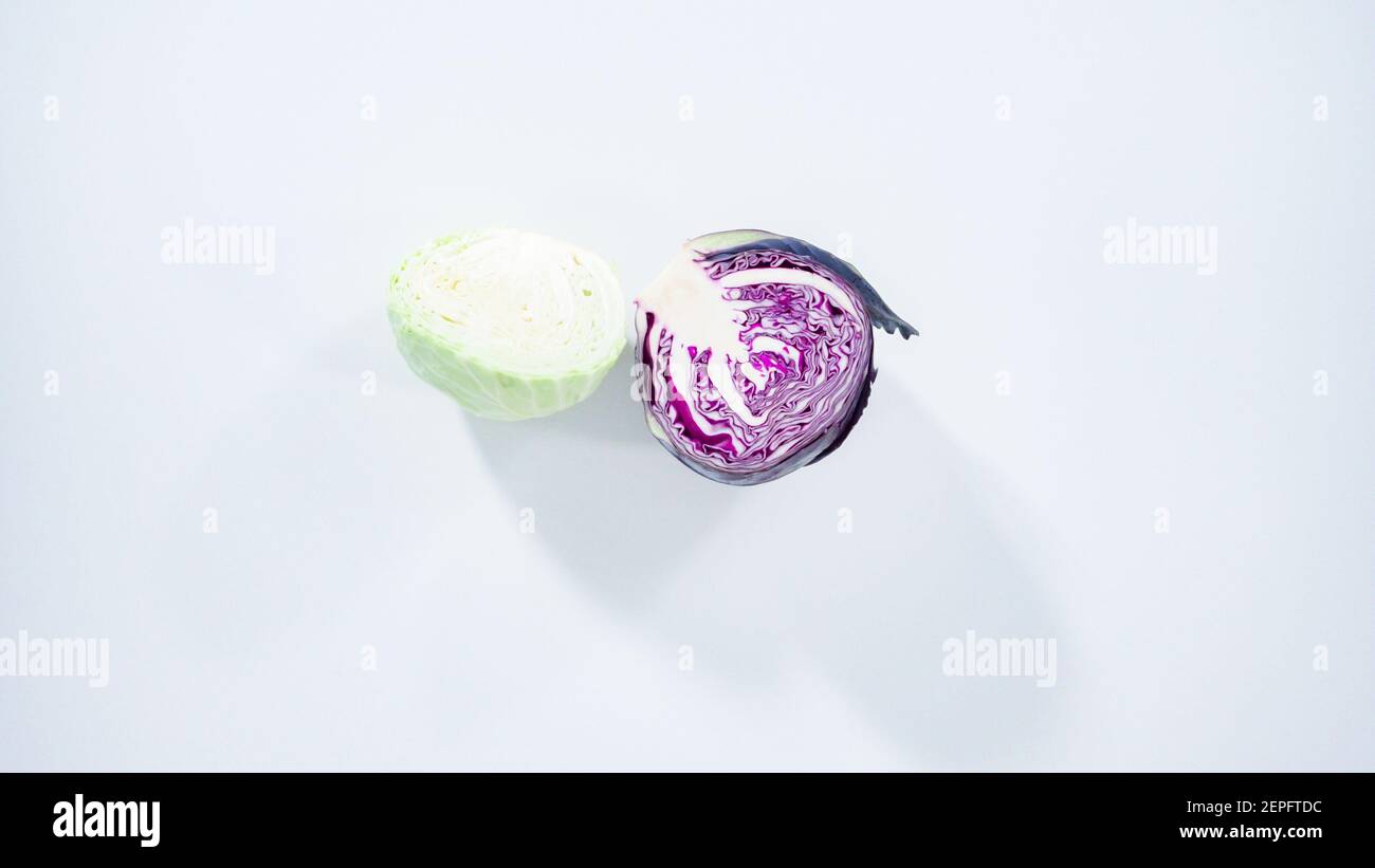 Flat lay. Step by step. Organic green and purple cabbage on a white ...