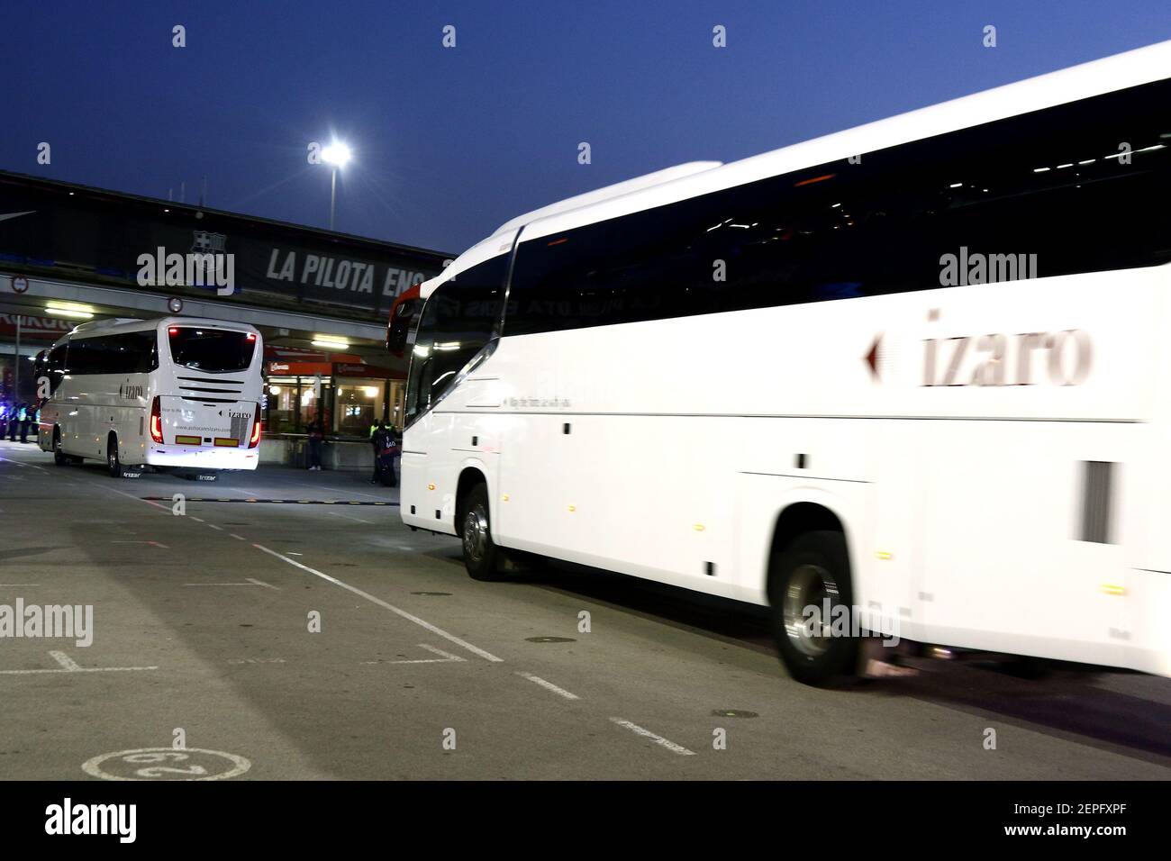 FC Barcelona and Real Madrid CF buses arriving together at the Camp Nou ...