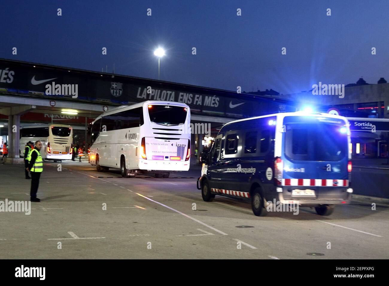 FC Barcelona and Real Madrid CF buses arriving together at the Camp Nou ...