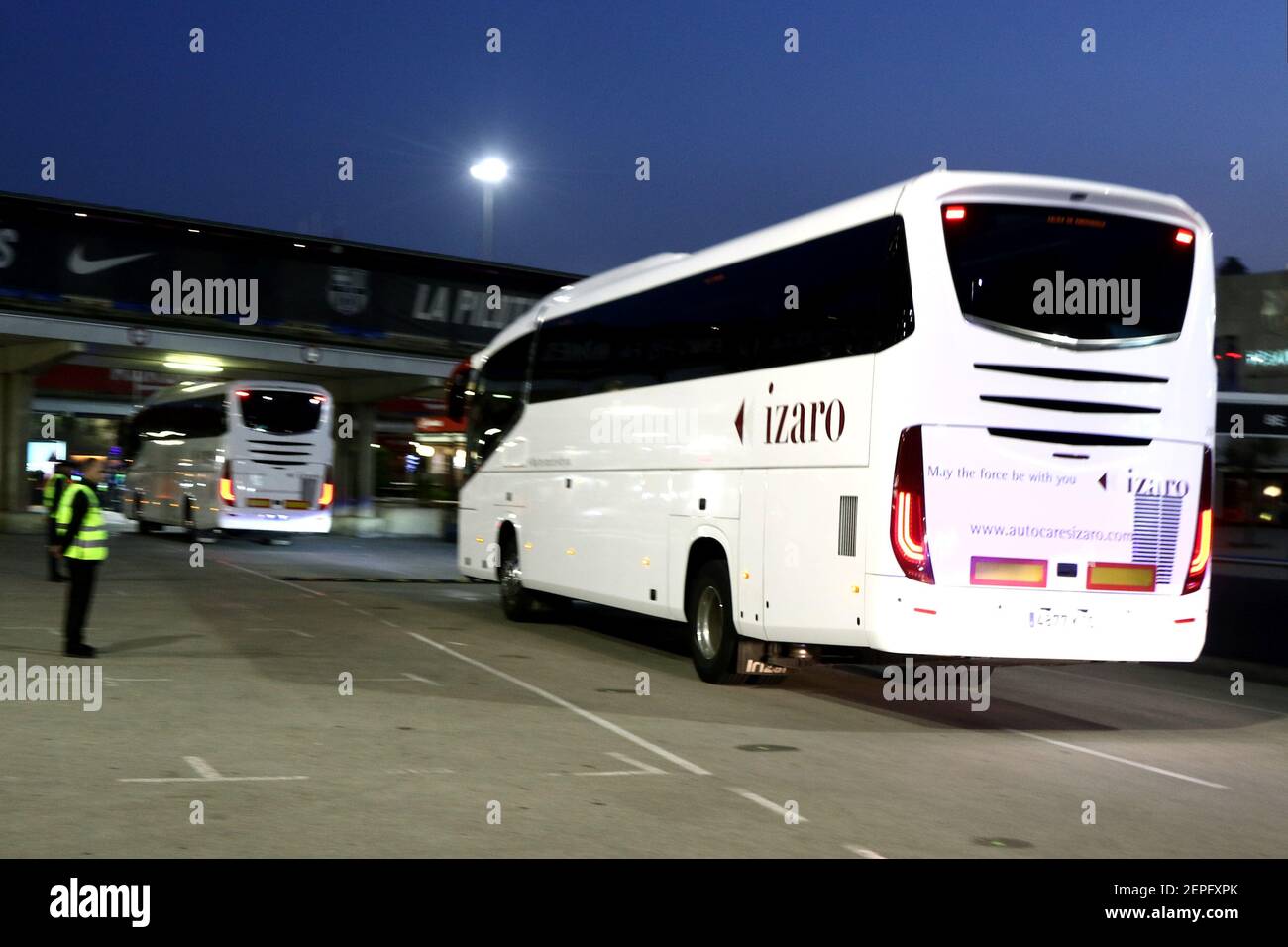 FC Barcelona and Real Madrid CF buses arriving together at the Camp Nou ...