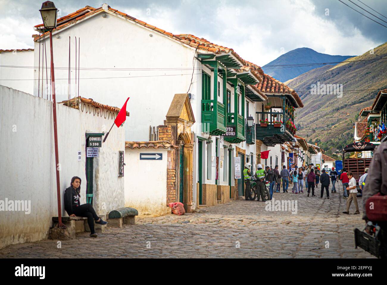 people, wearing poncho. Artisan sellers,tourism. Villa de Leyva 500 ...