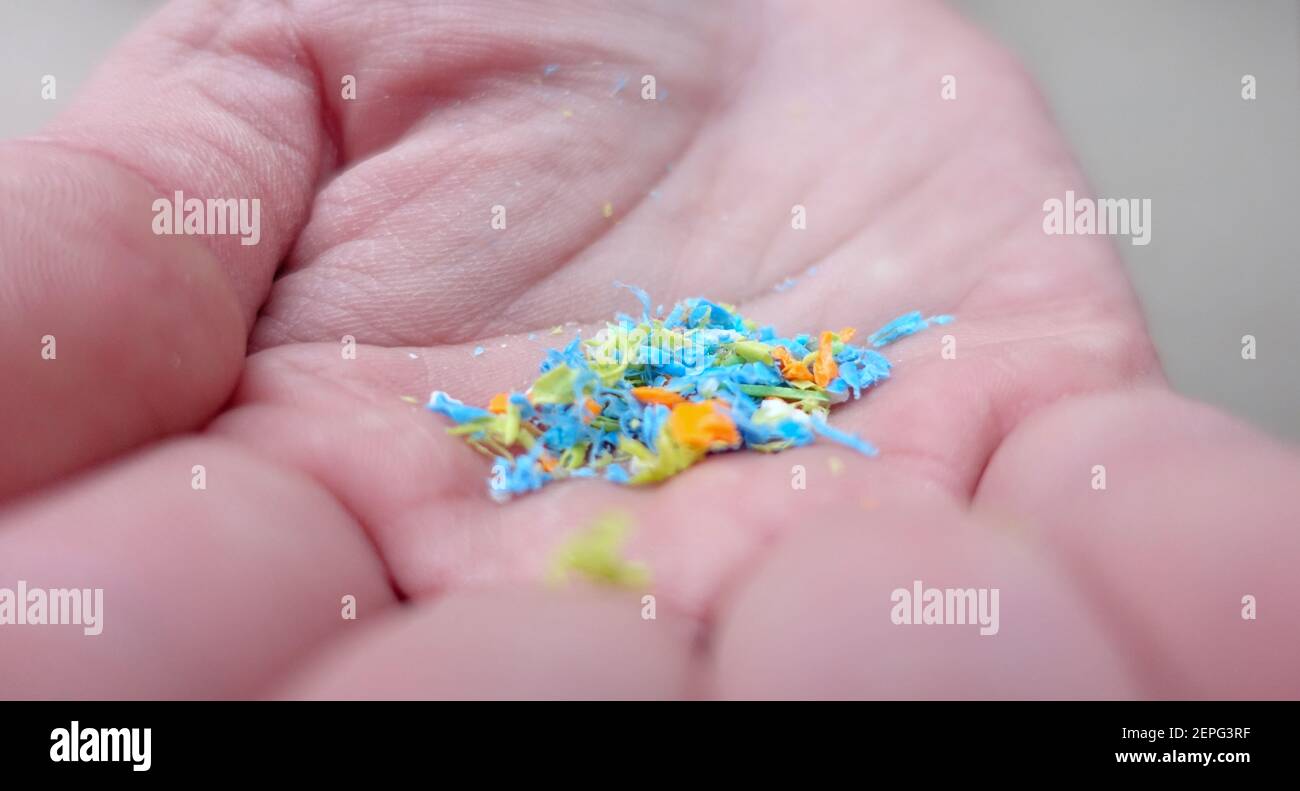 Side View Of a Person Holding Micro Plastics In His Hand. Non ...