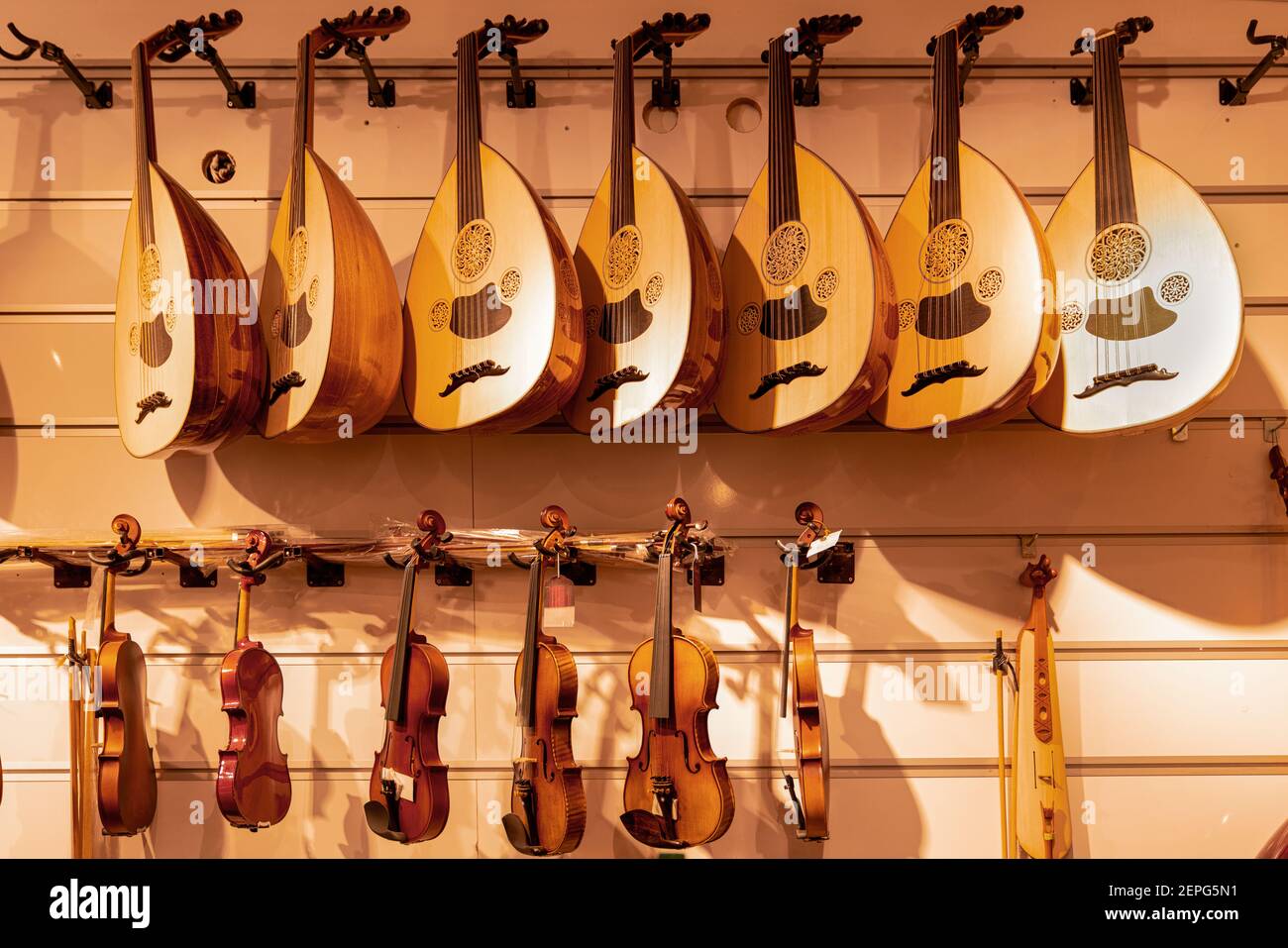 Interior view of Turkish musical instrument with hanging lute and ...