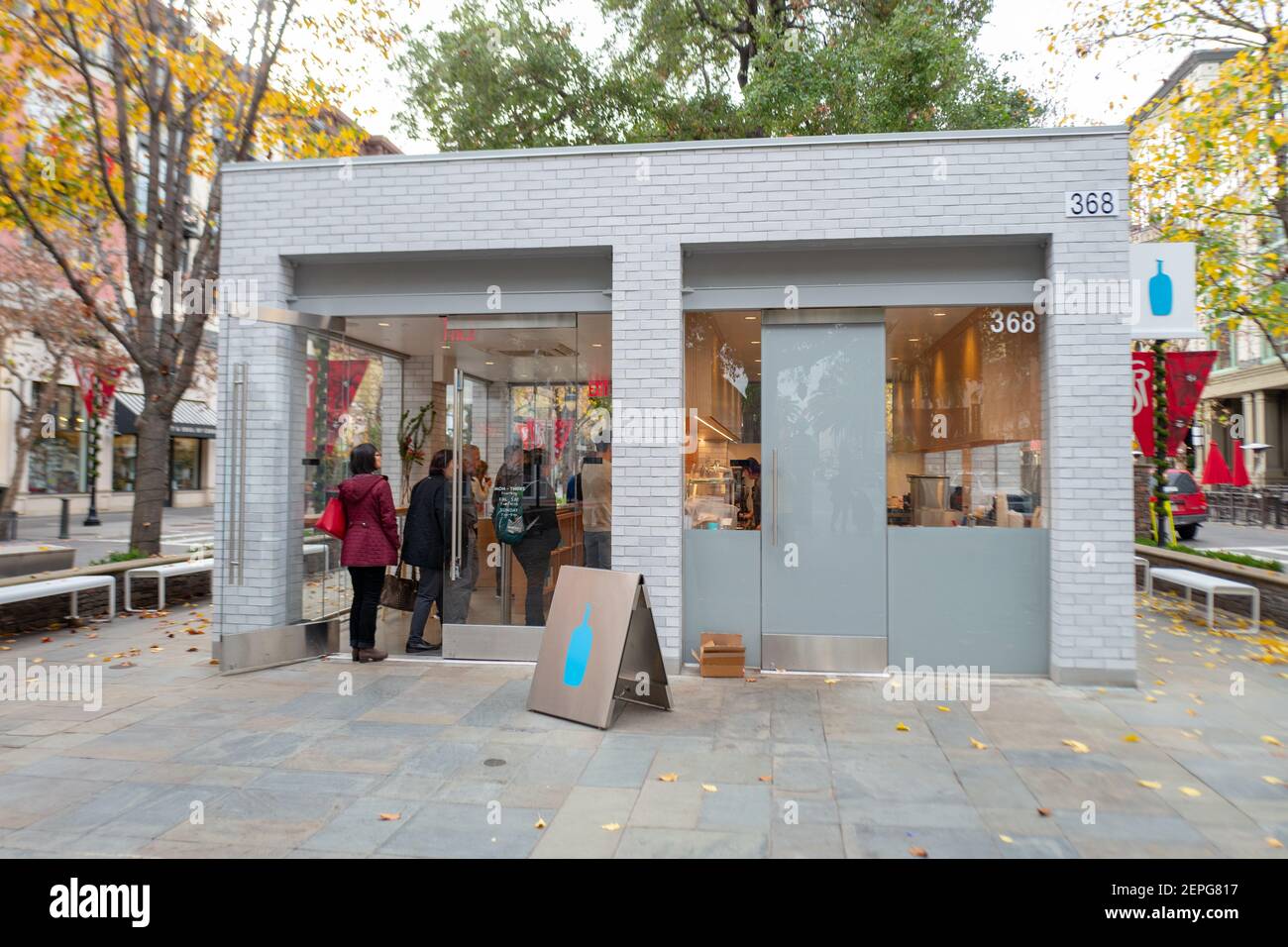People line up to enter newly opened Blue Bottle Coffee cafe at the ...