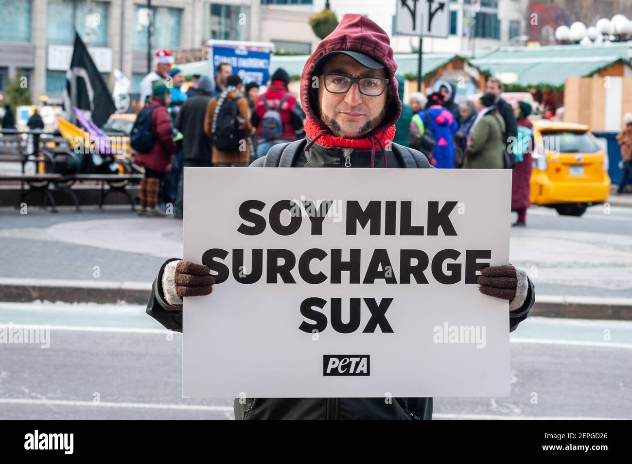 Animal rights activists protest the extra charge in plant-based milk ...