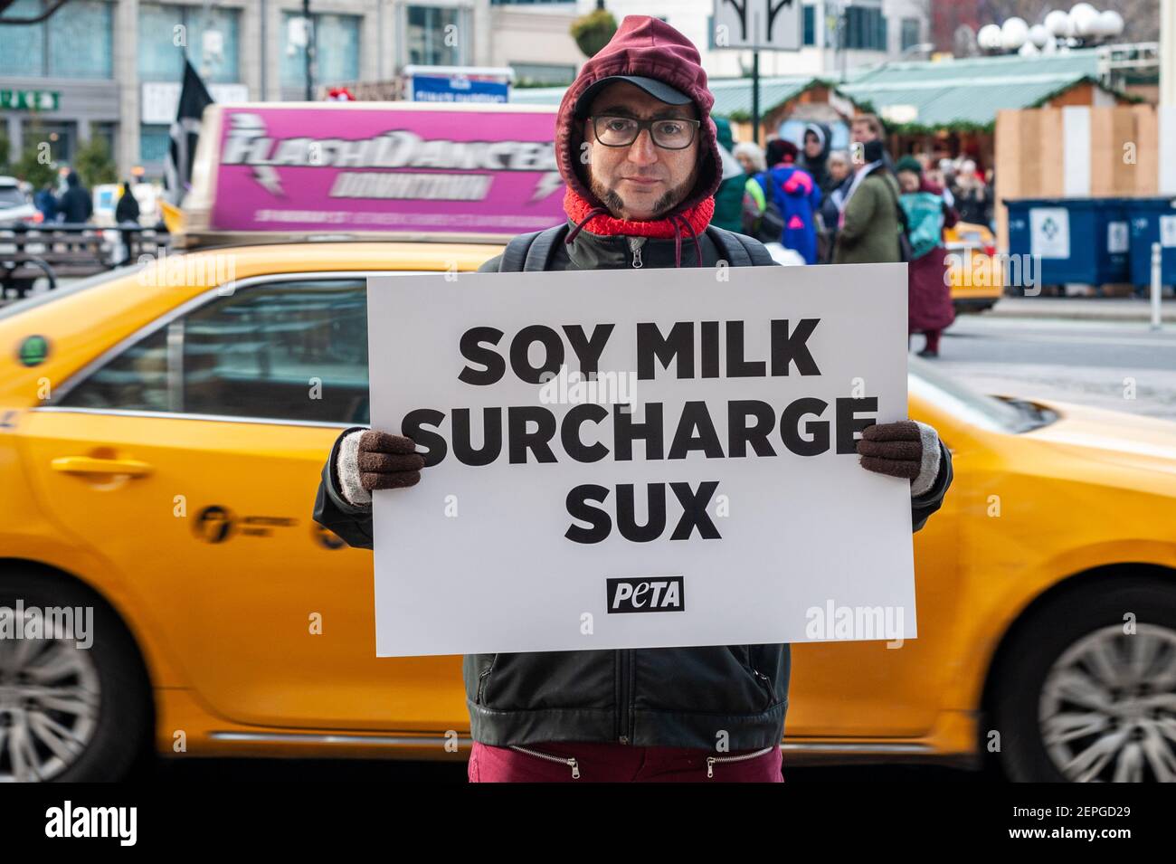 Animal rights activists protest the extra charge in plant-based milk ...