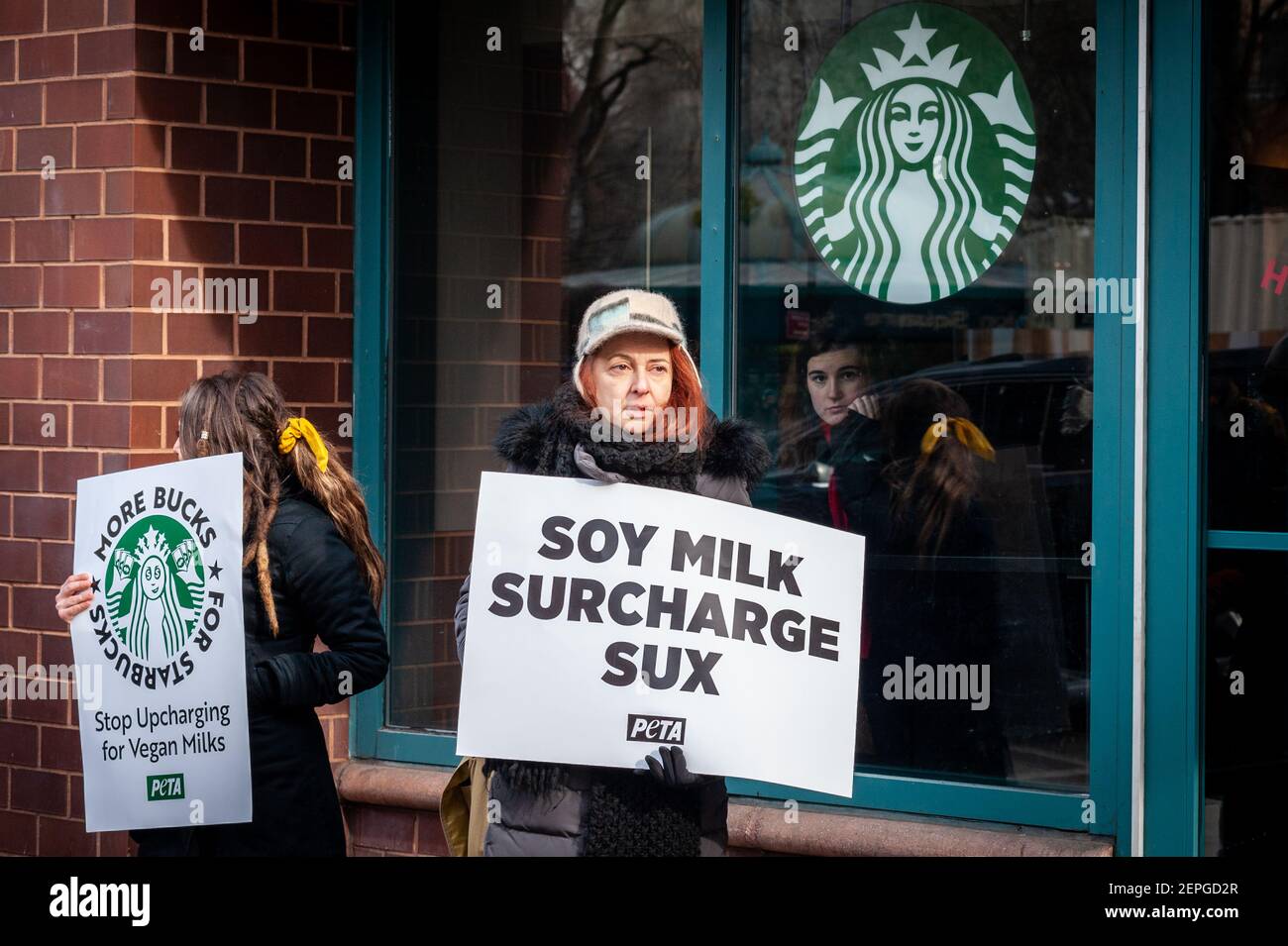 Animal rights activists protest the extra charge in plant-based milk ...