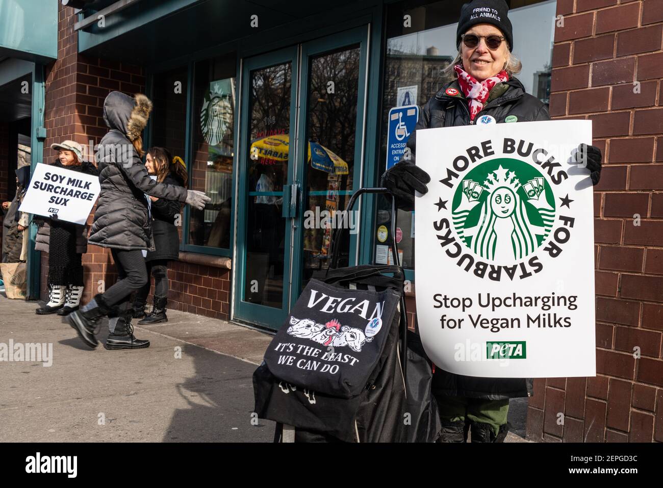 Animal rights activists protest the extra charge in plant-based milk ...