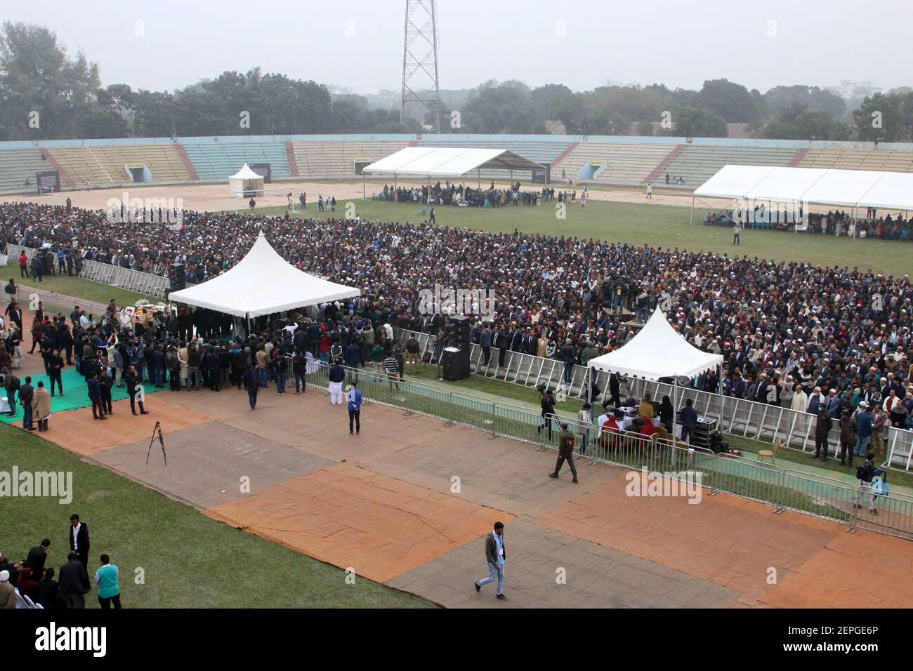 Crowds of people gather during the ceremony at the Banani Graveyard in ...