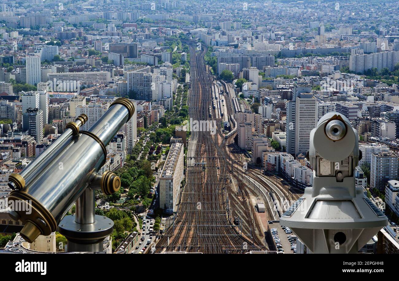 Telescope viewer and city skyline at daytime. Paris, France. Taken from ...