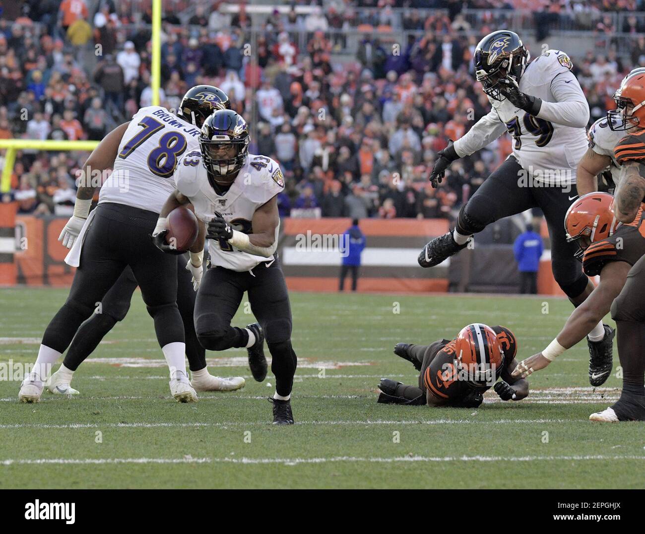 Baltimore Ravens' Ronnie Stanley jumps over Cleveland Browns' Juston ...