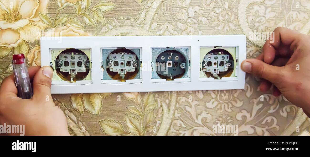 write electrical work, switch and socket installation.selectiv focus ...