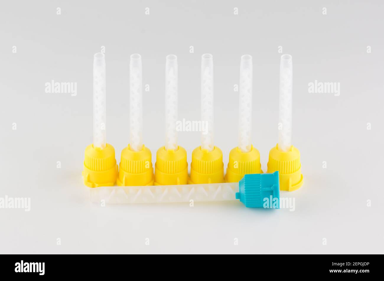 Cannula for mixing dental impression masses isolated on white ...