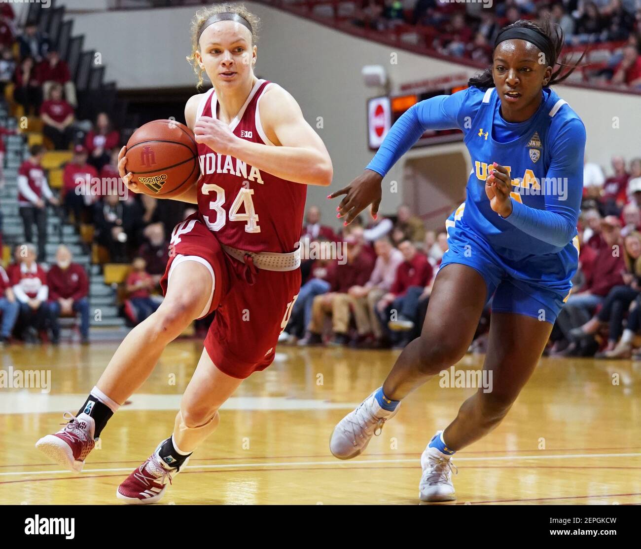 Indiana Hoosiers, Grace Berger (34) drives to the basket around UCLA ...