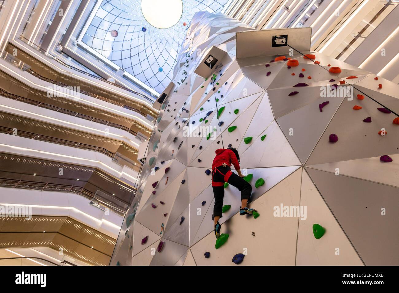 A young woman tries out the 55-meter-tall world's tallest indoor roket ...
