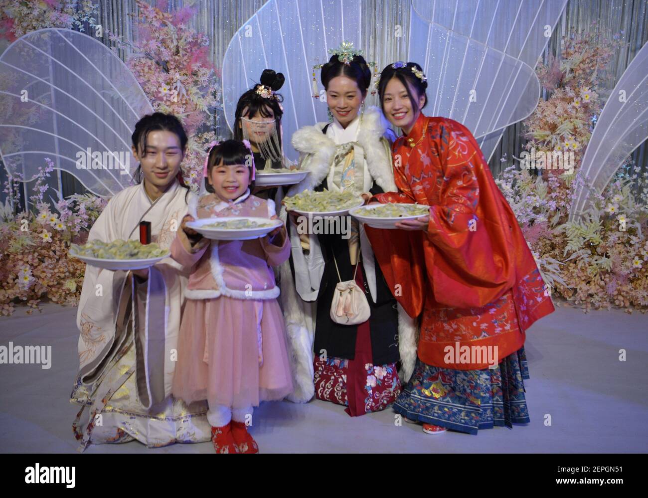 Young people wearing traditional Han clothes to welcome the traditional ...