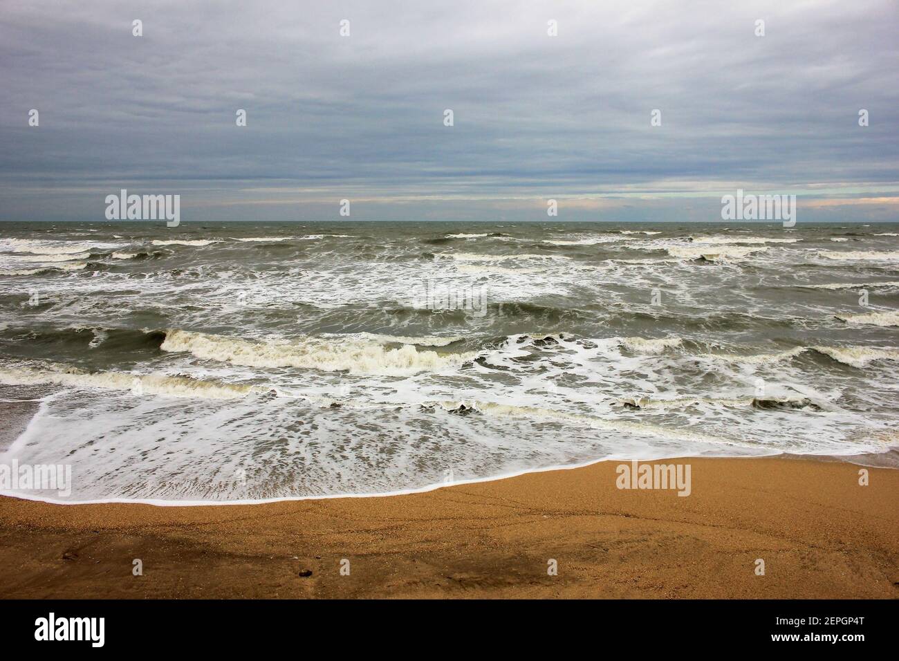 The waves crash against the rock. Caspian Sea Stock Photo - Alamy