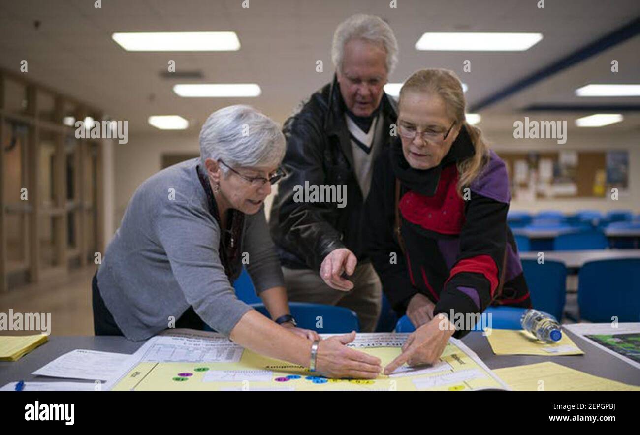 Ginny Yingling, left, of the Minnesota Department of Health, talked ...