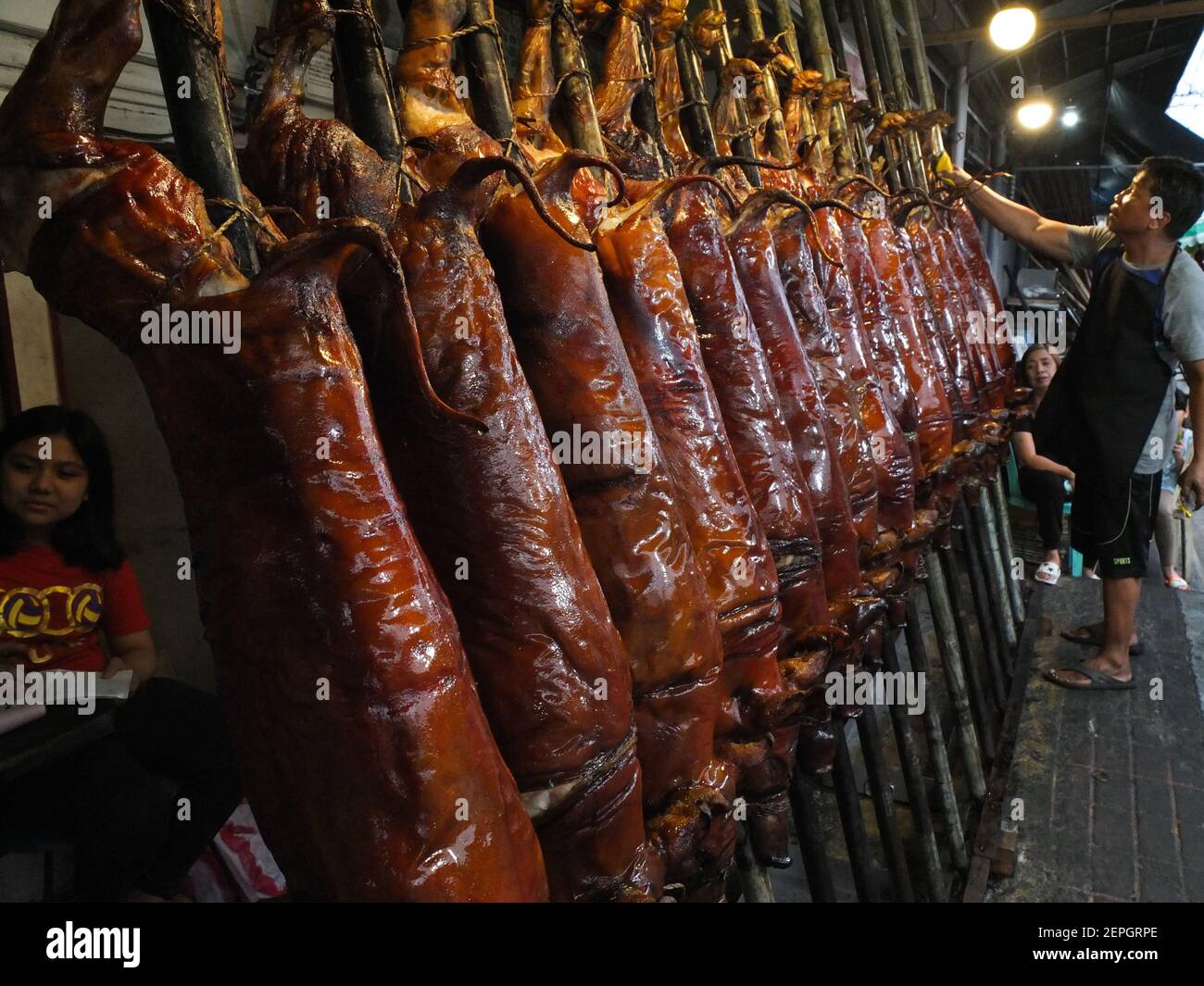 Rows of lechon displayed in Quezon City. In the Philippines, during the ...