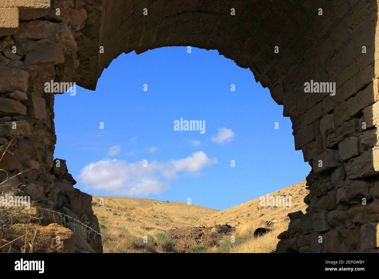 Gobustan. Azerbaijan. The arch of the old stone bridge over the river ...