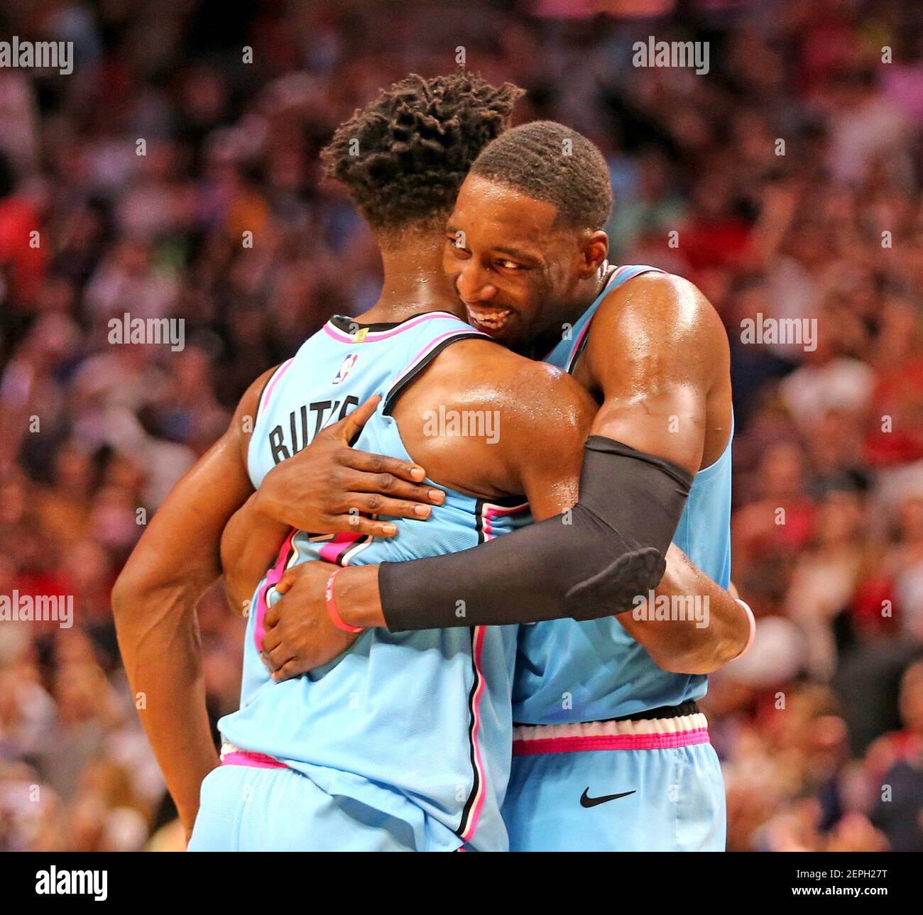 The Miami Heat's Jimmy Butler and Bam Adebayo hug after defeating the ...