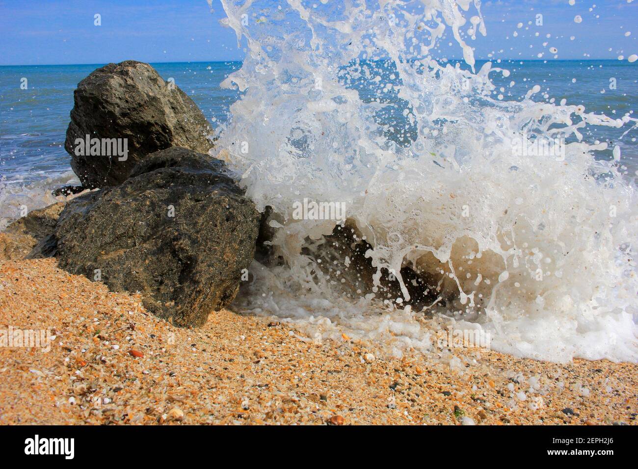 The waves crash against the rock. Caspian Sea Stock Photo - Alamy