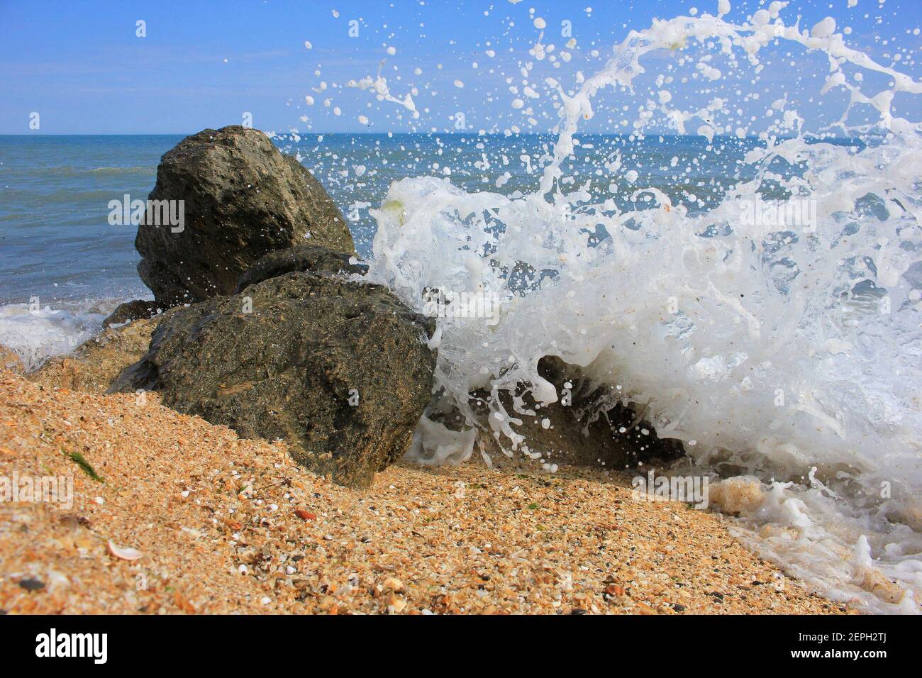 The waves crash against the rock. Caspian Sea Stock Photo - Alamy