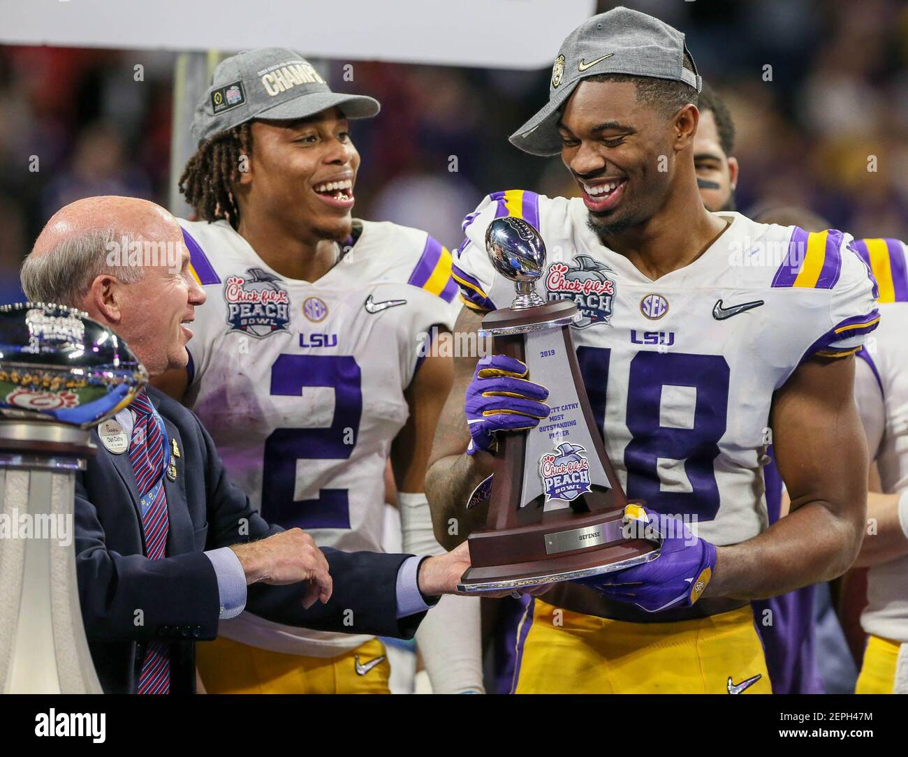 December 28, 2019: LSU Linebacker K'Lavon Chaisson (18) is presented ...