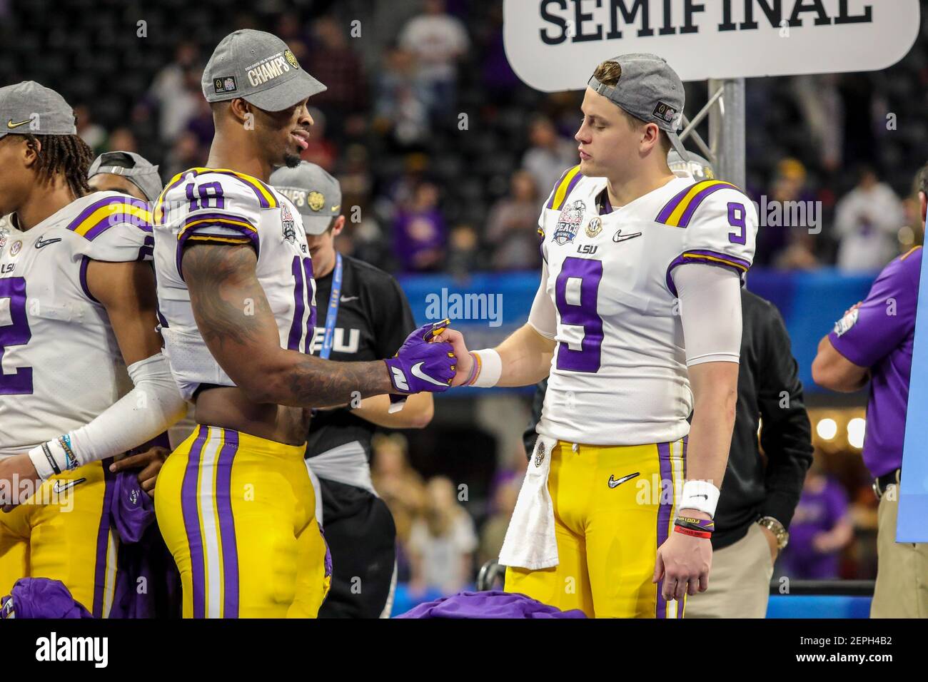 December 28, 2019: LSU's K'Lavon Chaisson (18) and Joe Burrow (9 ...