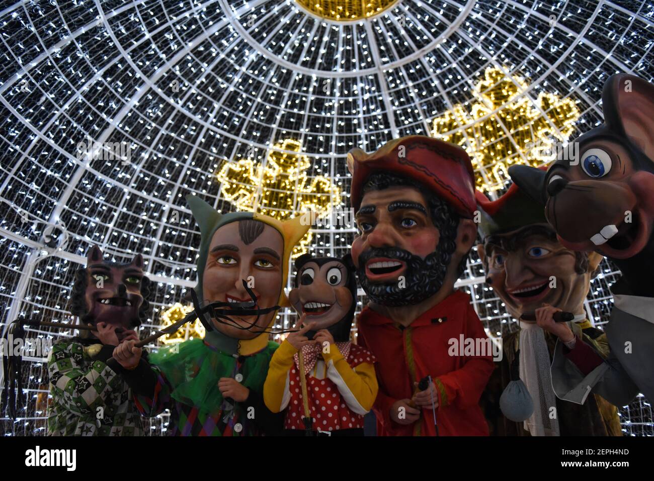Cabezudos (Big Heads) are seen during the celebration. They were ...