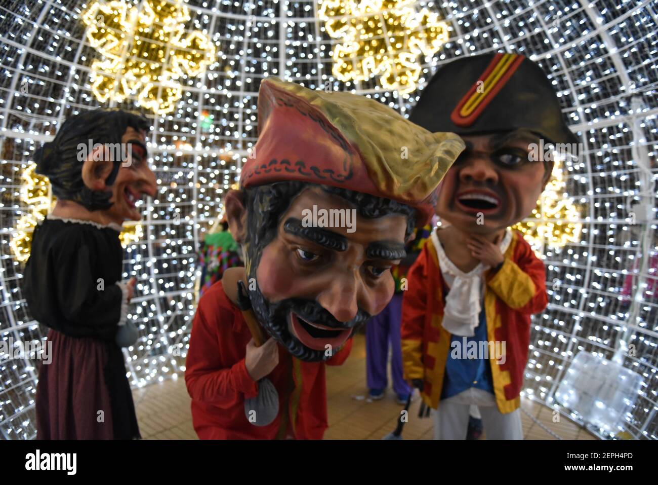 Cabezudos (Big Heads) are seen during the celebration. They were ...