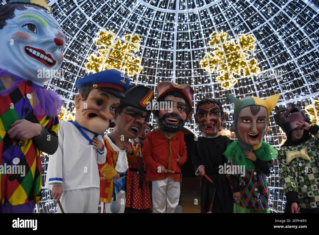 Cabezudos (Big Heads) are seen during the celebration. They were ...