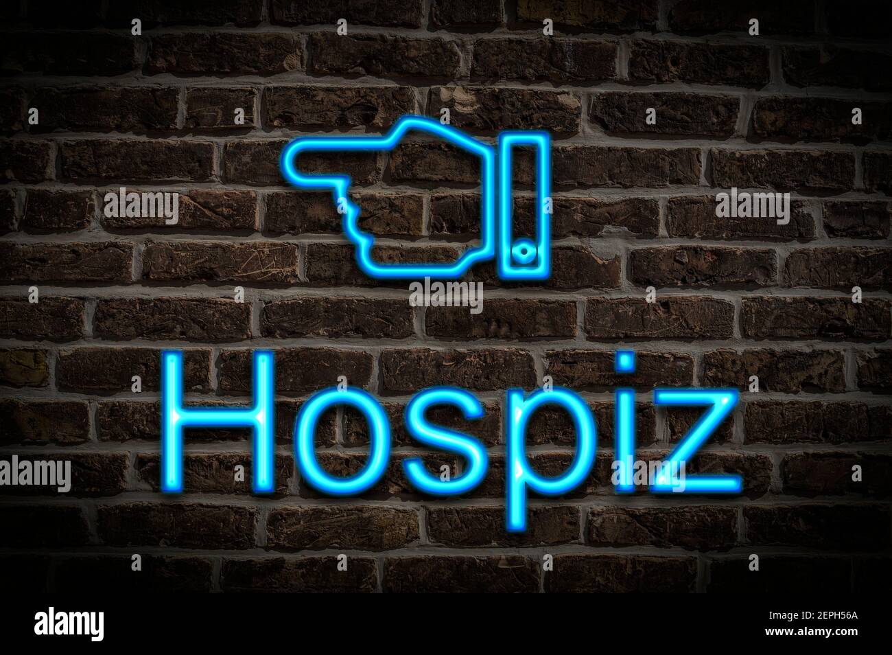 Detail photo of a a neon sign on a wall with the inscription Hospiz ...